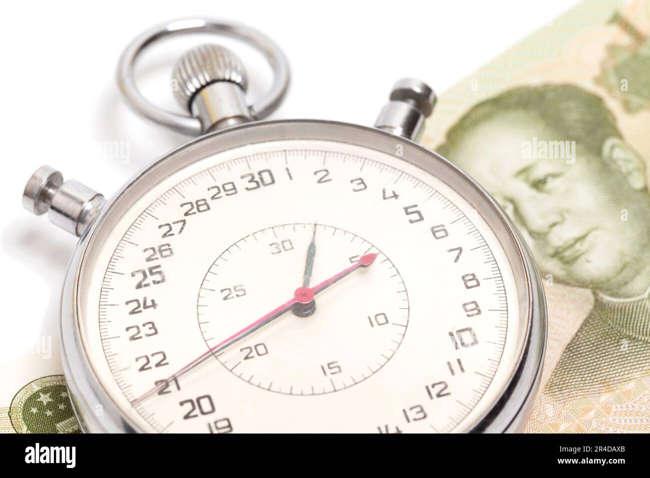 Stopwatch with chinese yuan. Time is money concept Stock Photo - Alamy