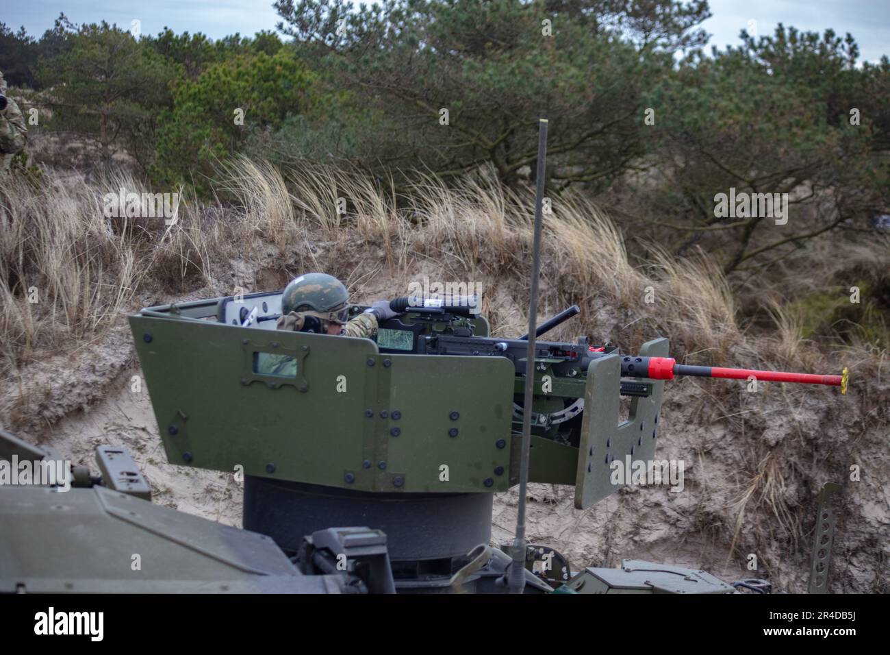 Danish soldiers assigned to the 1st Artillery Battalion conduct live ...