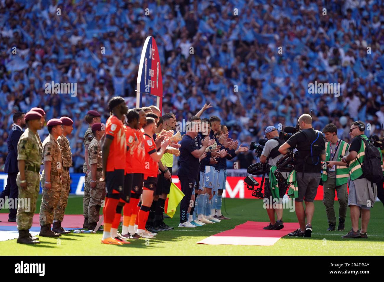 Coventry City and Luton Town players line up during the Sky Bet ...