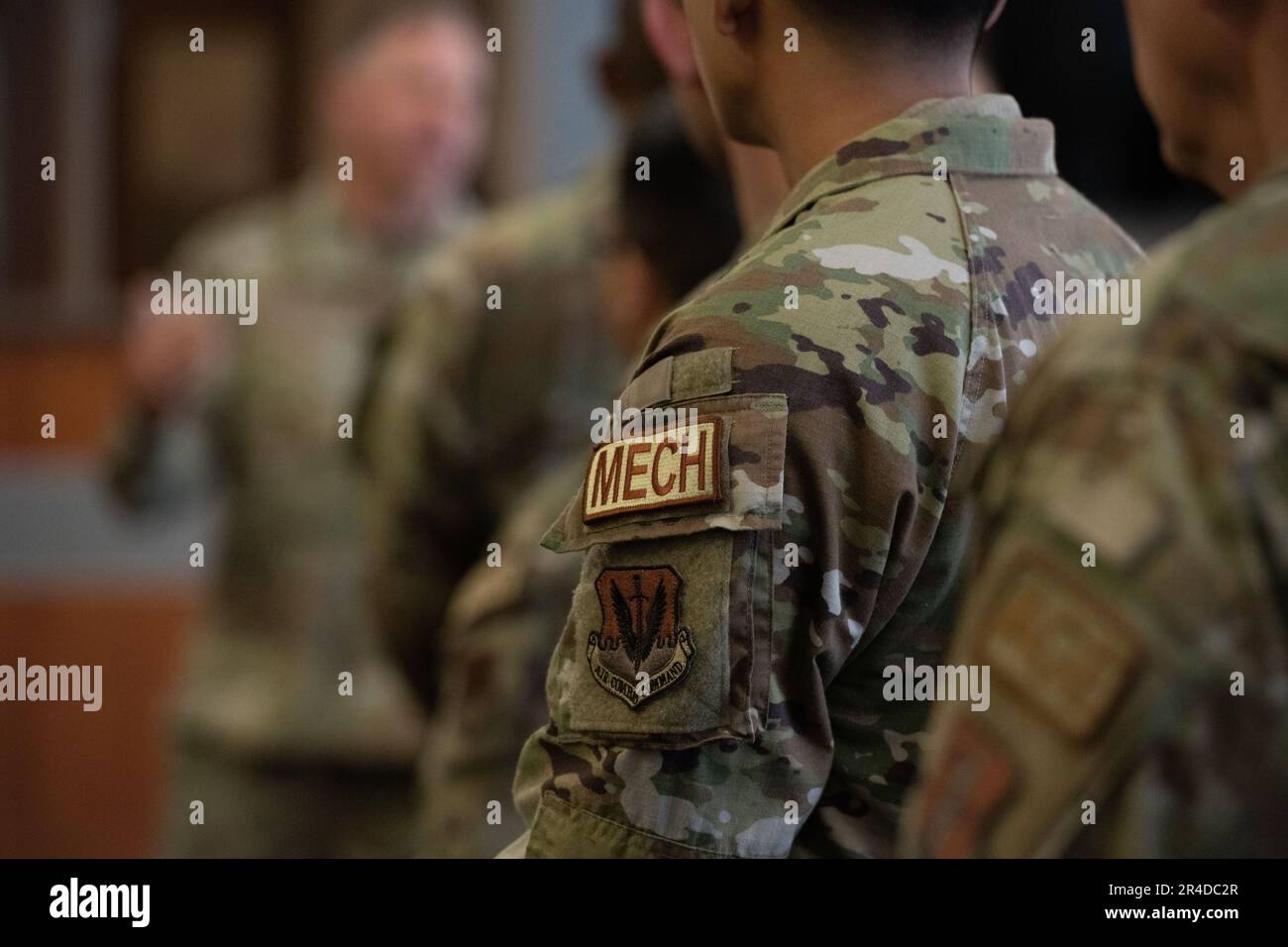 Service members assigned to the 163d Attack Wing prepare to be briefed ...