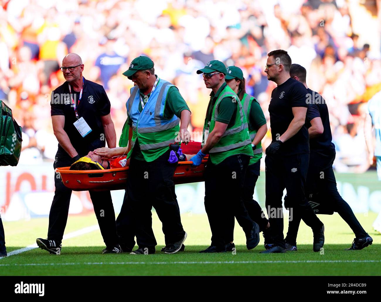 Luton Town's Tom Lockyer leaves the pitch on a stretcher after becoming ...
