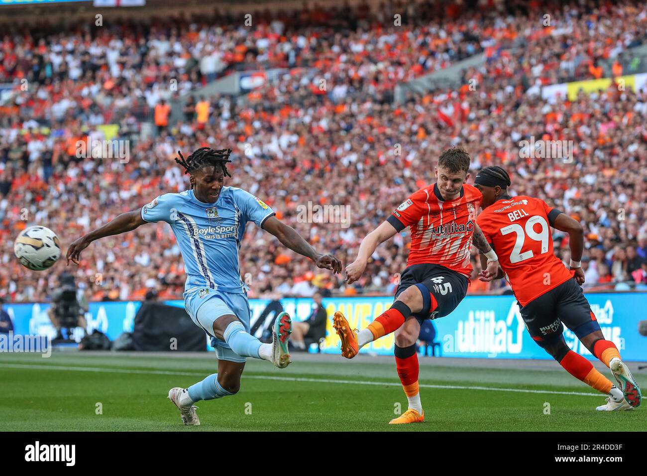 Alfie Doughty #45 of Luton Town crosses the ball during the Sky Bet ...