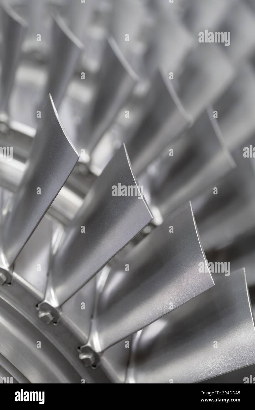 Vertical close-up shot of turbine blades set, aircraft or energetics ...