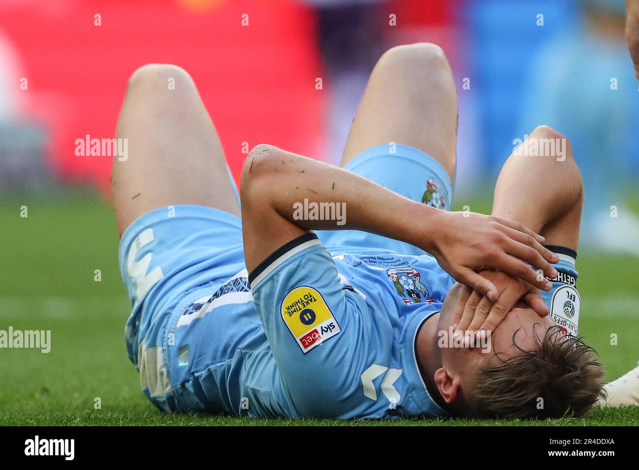 Callum Doyle #3 of Coventry City goes down injured during the Sky Bet ...