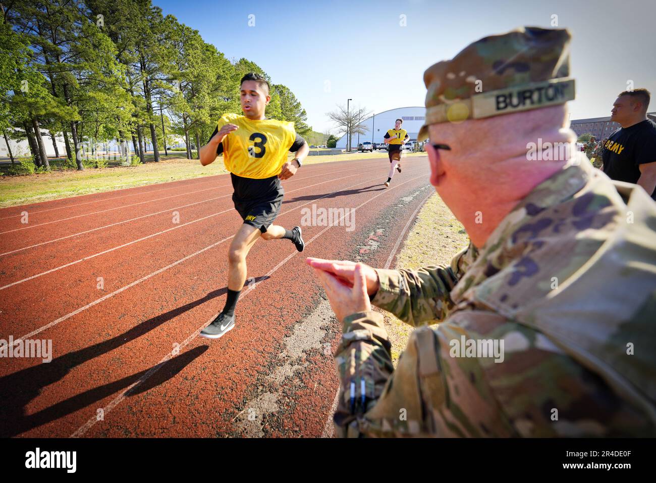 Cadre members cheer on participants as they complete the 1000-meter ...