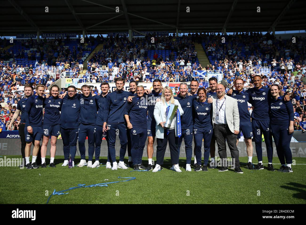 Chelsea manager Emma Hayes and back room staff with the trophy after ...
