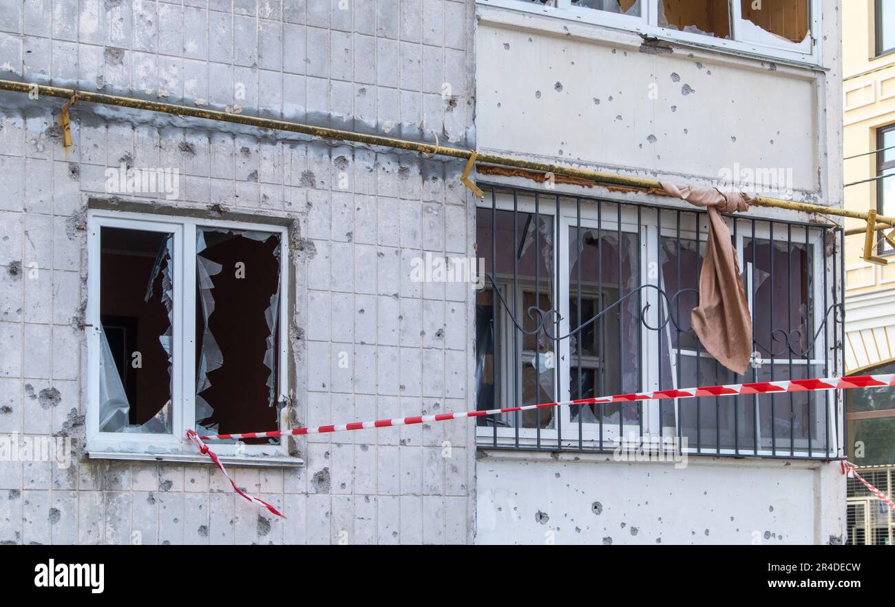 Residential buildings, windows and balconies were damaged by the blast ...