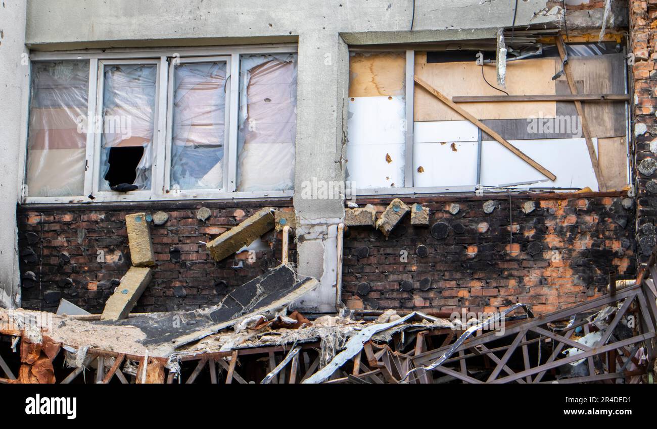 Residential buildings, windows and balconies were damaged by the blast ...