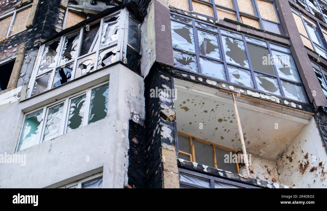 Residential buildings, windows and balconies were damaged by the blast ...