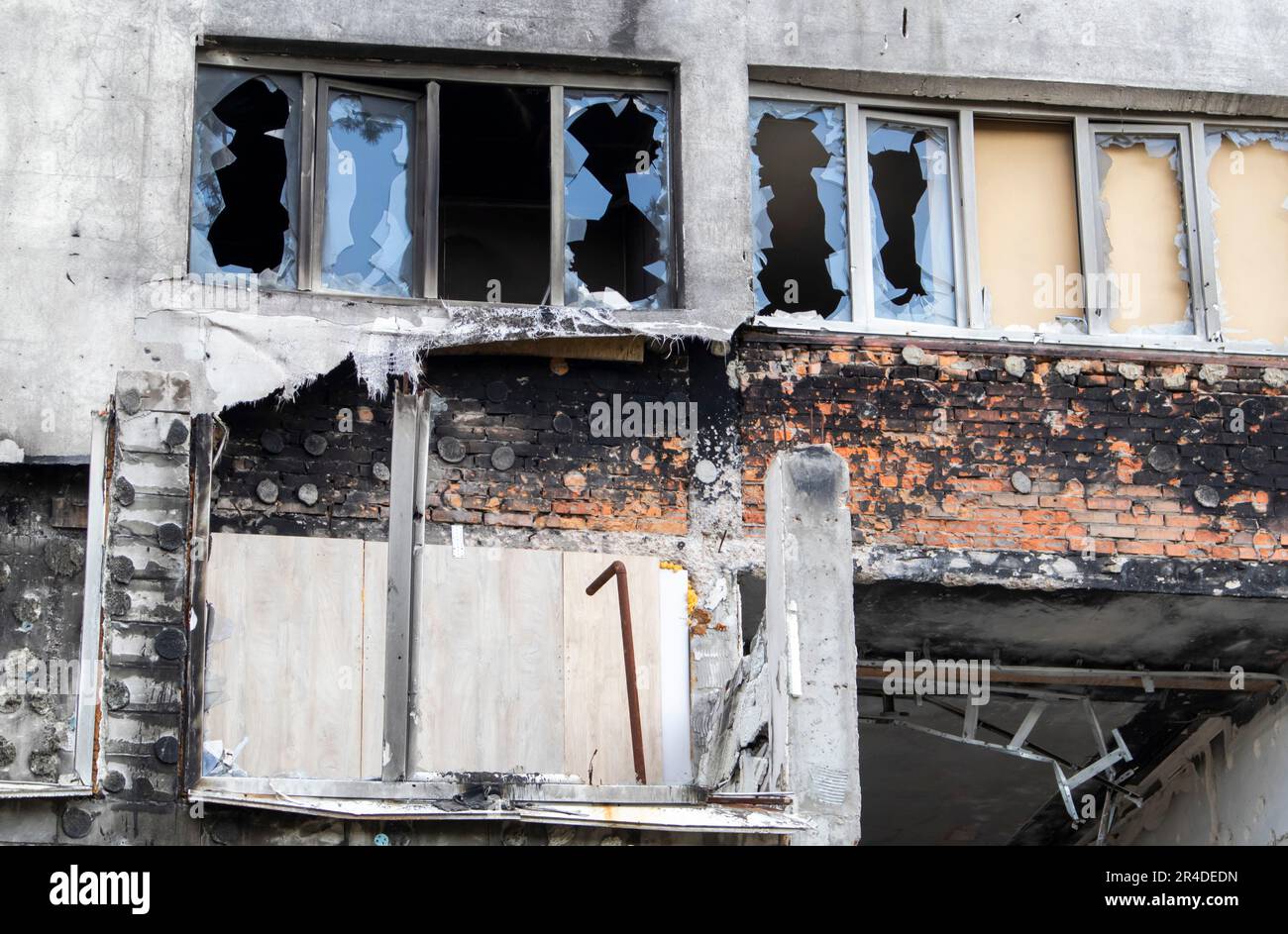 Residential buildings, windows and balconies were damaged by the blast ...