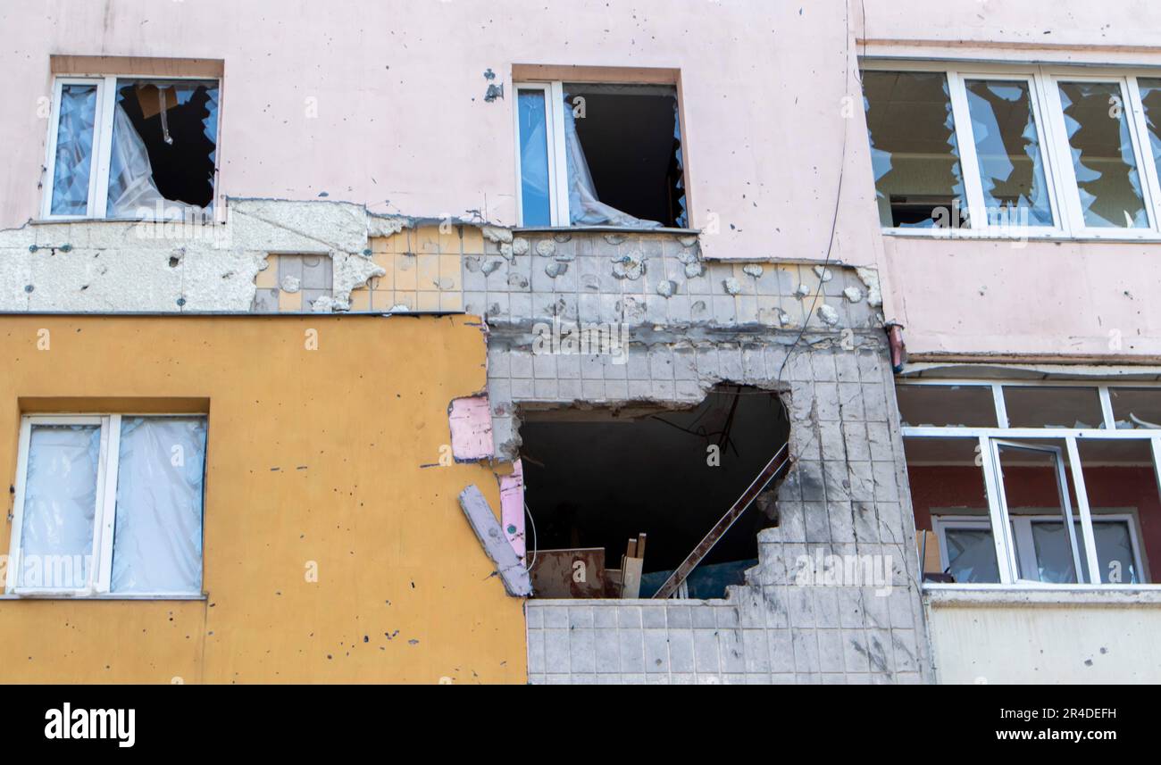 Residential buildings, windows and balconies were damaged by the blast ...