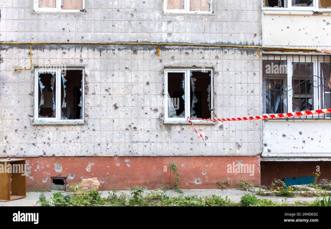 Residential buildings, windows and balconies were damaged by the blast ...
