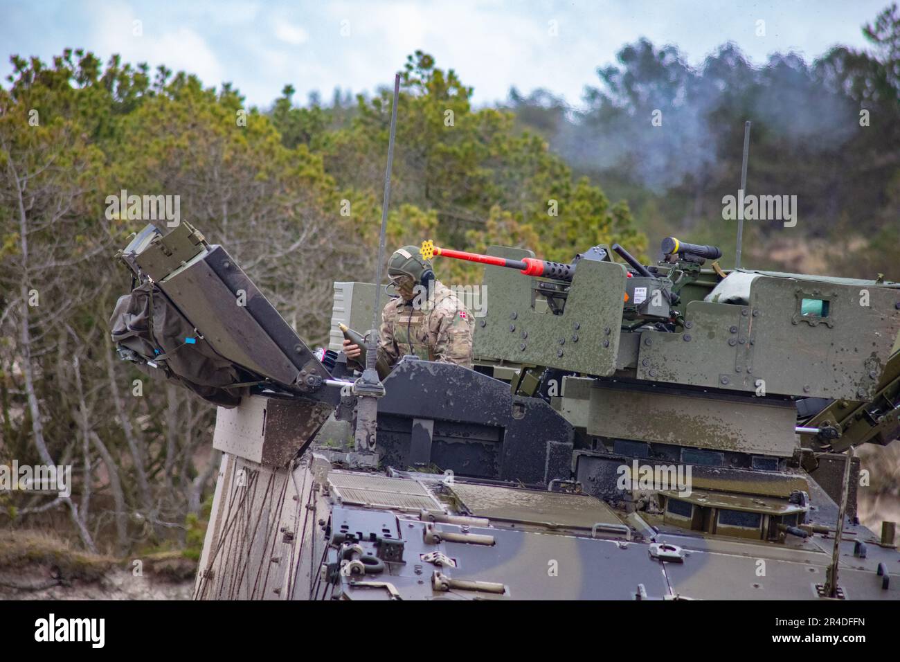 Danish soldiers assigned to the 1st Artillery Battalion conduct live ...