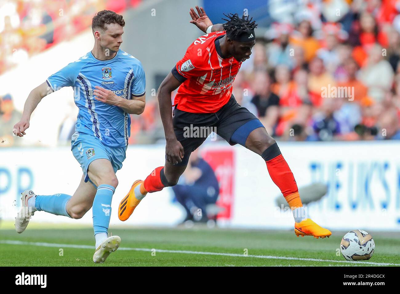 Elijah Adebayo #11 of Luton Town can’t keep the ball in play during the ...