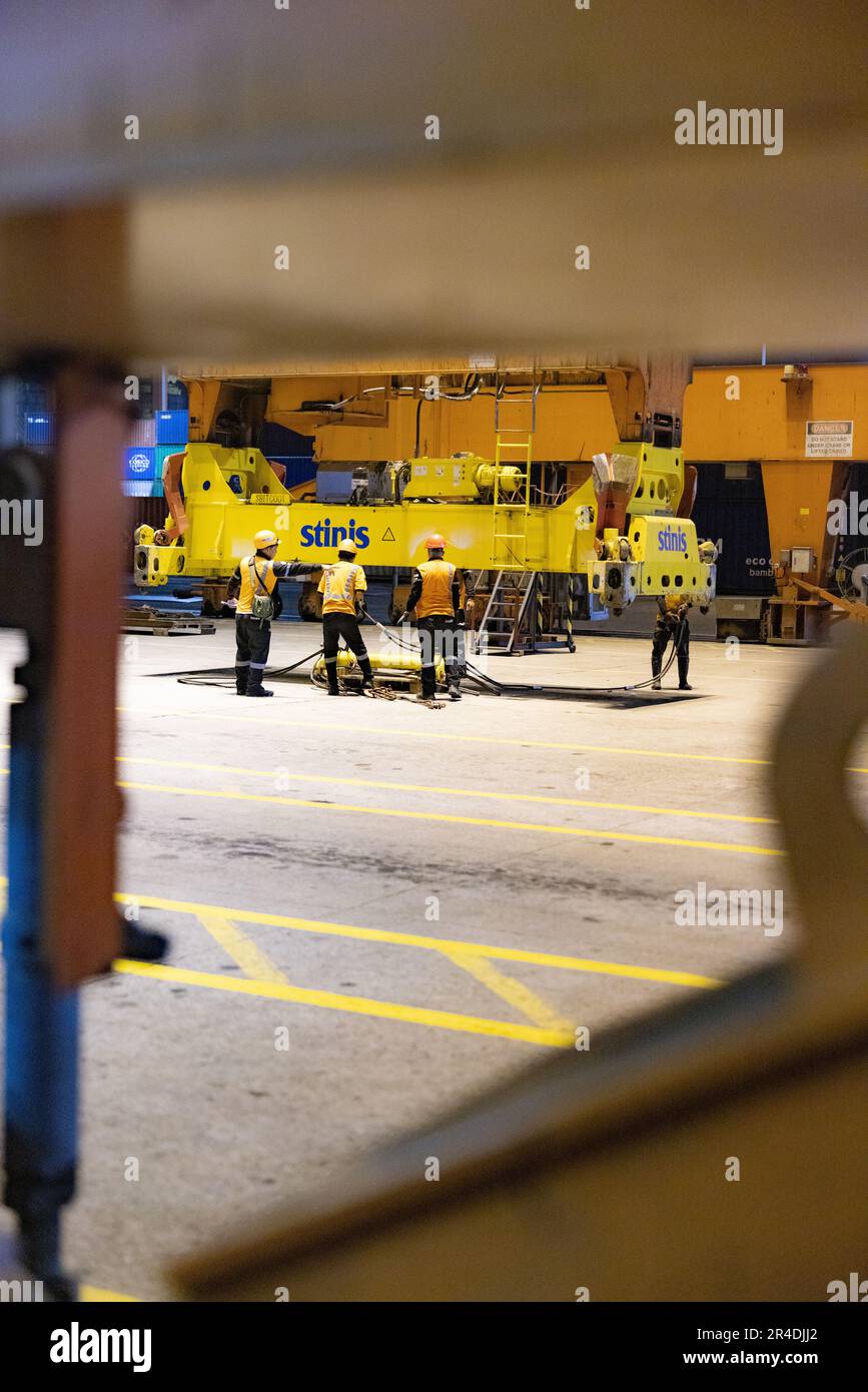 Philippine civilians prepare to unload at Subic Bay in support of ...