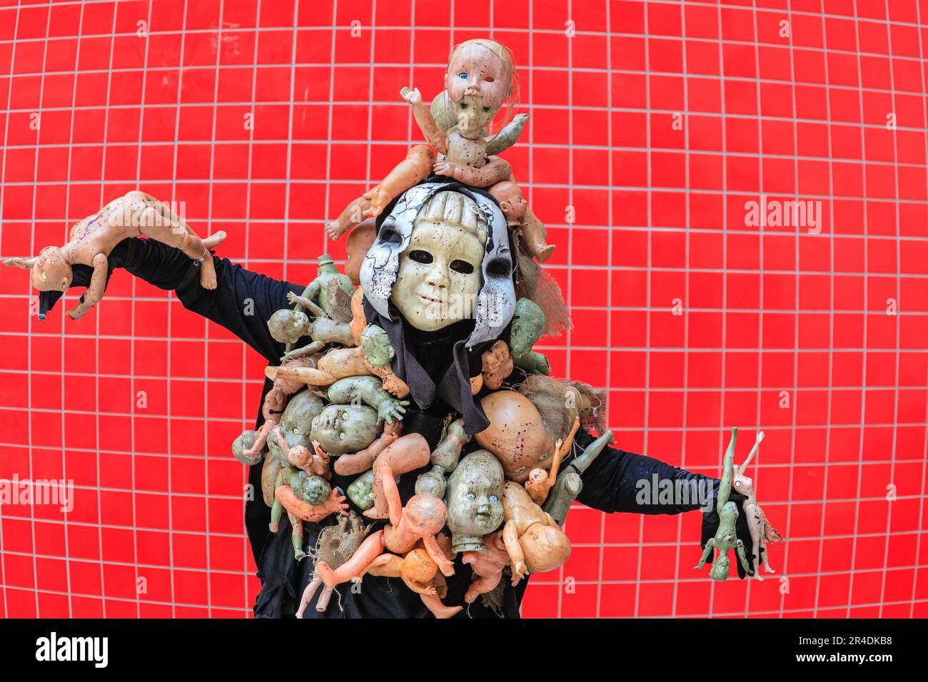 London, UK. 27th May, 2023. Alice, stiltwalking through the venue, in ...