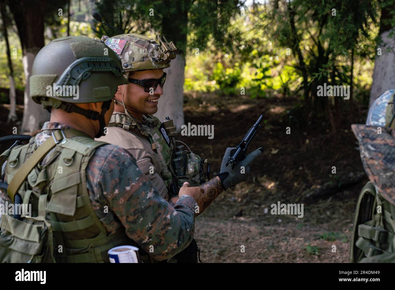 A 7th Special Forces Group (Airborne) Soldier teaches proper firing ...