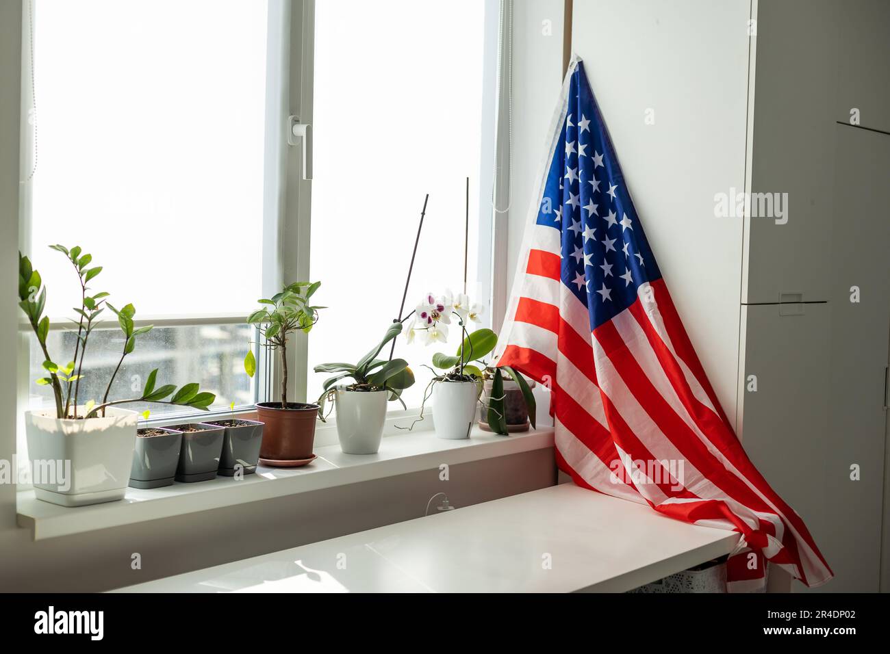 Interior of stylish room with modern workplace and USA flag Stock Photo ...