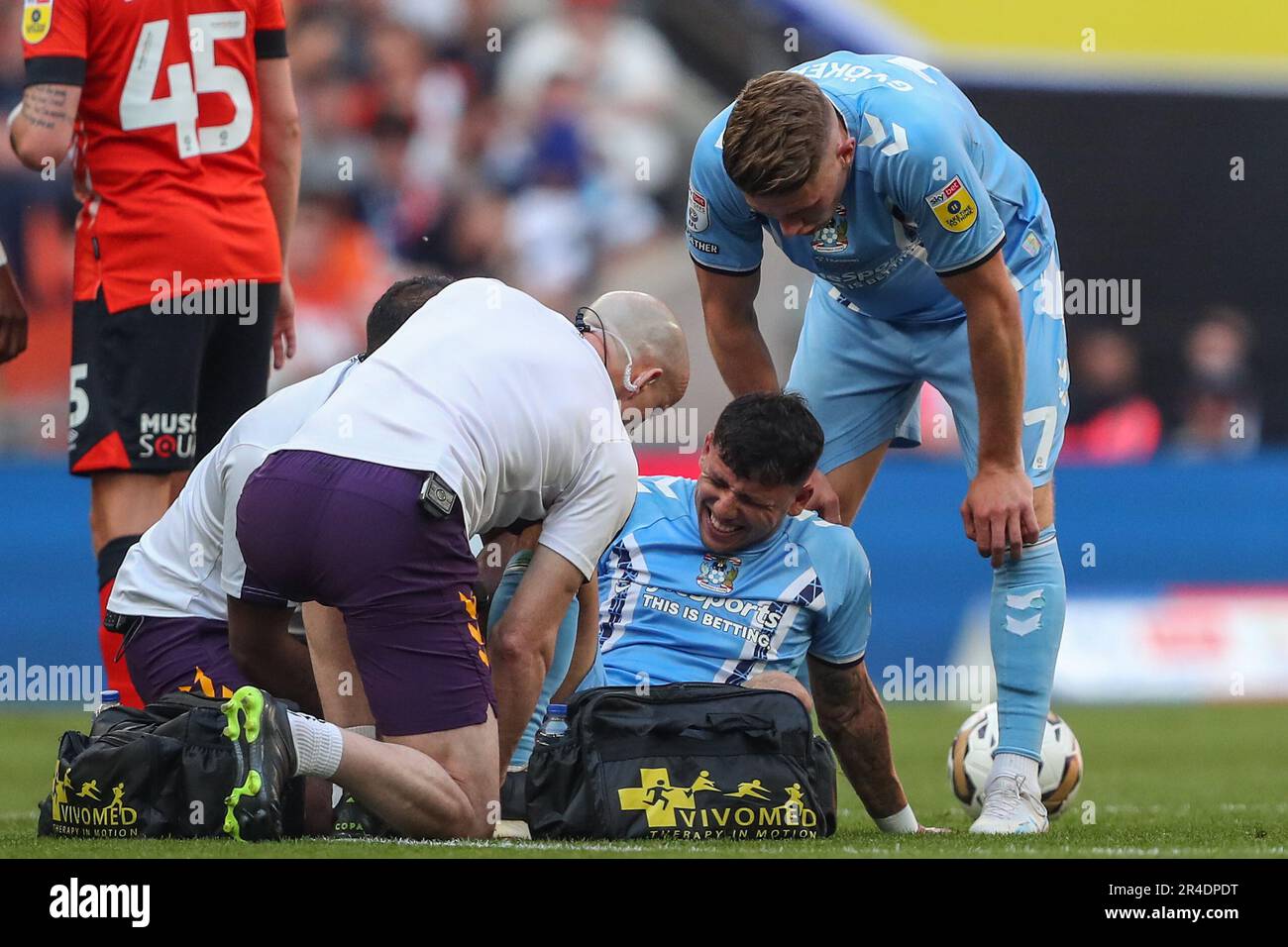 Gustavo Hamer #38 of Coventry City receives treatment during the Sky ...