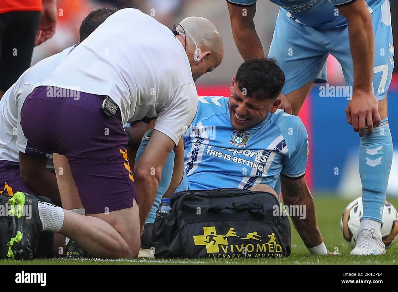 Gustavo Hamer #38 of Coventry City receives treatment during the Sky ...