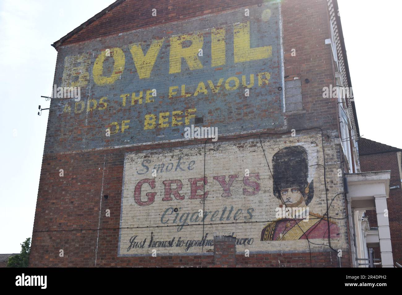Ghost ads for Bovril and Grey's cigarettes on a house in Bedford Stock ...