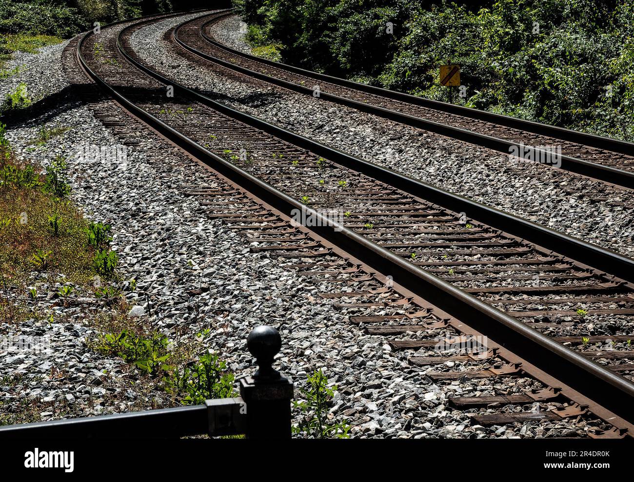 Rail lines at a suburban train station Stock Photo - Alamy
