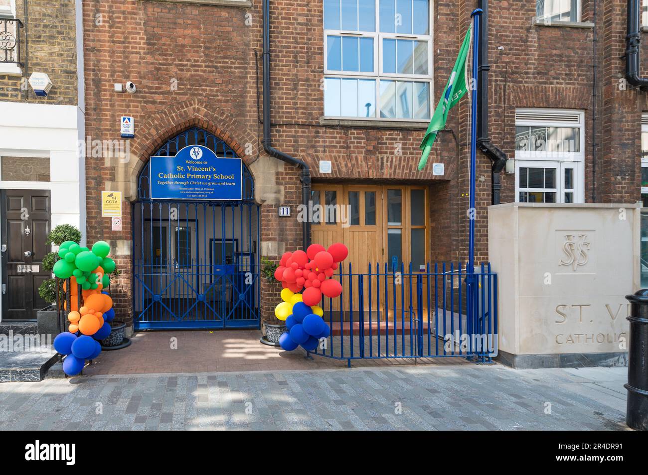 Colourful balloons tied to railings at the entrance to St Vincent's ...