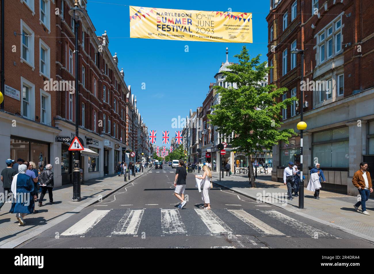 Hang banner across street hi-res stock photography and images - Alamy