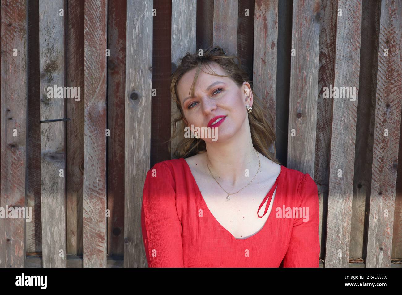 Photo of beautiful Russian lady in a park by a lake Stock Photo - Alamy
