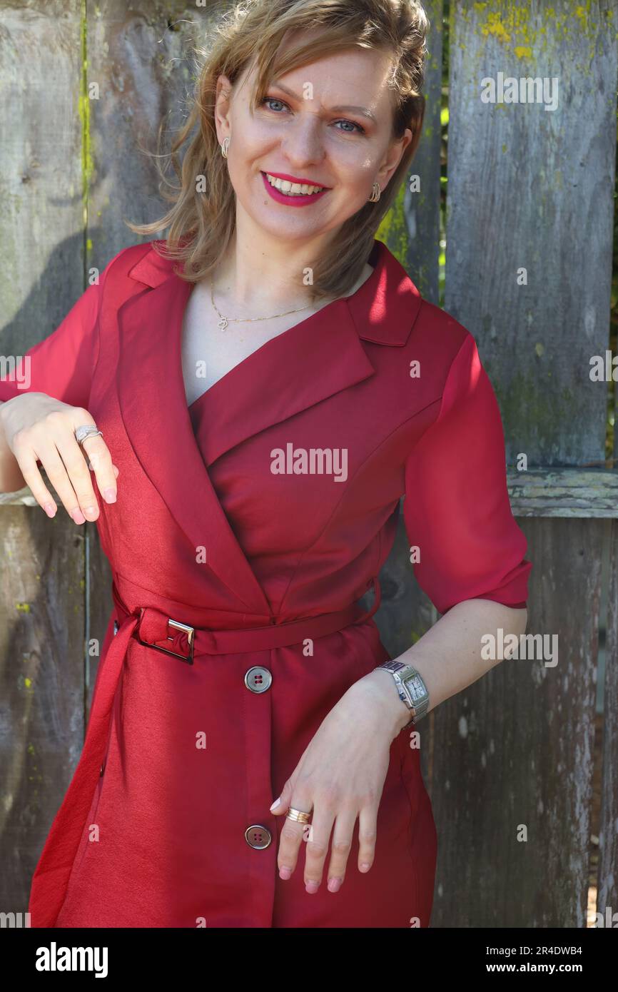 Photo of beautiful Russian lady in a park by a lake Stock Photo - Alamy