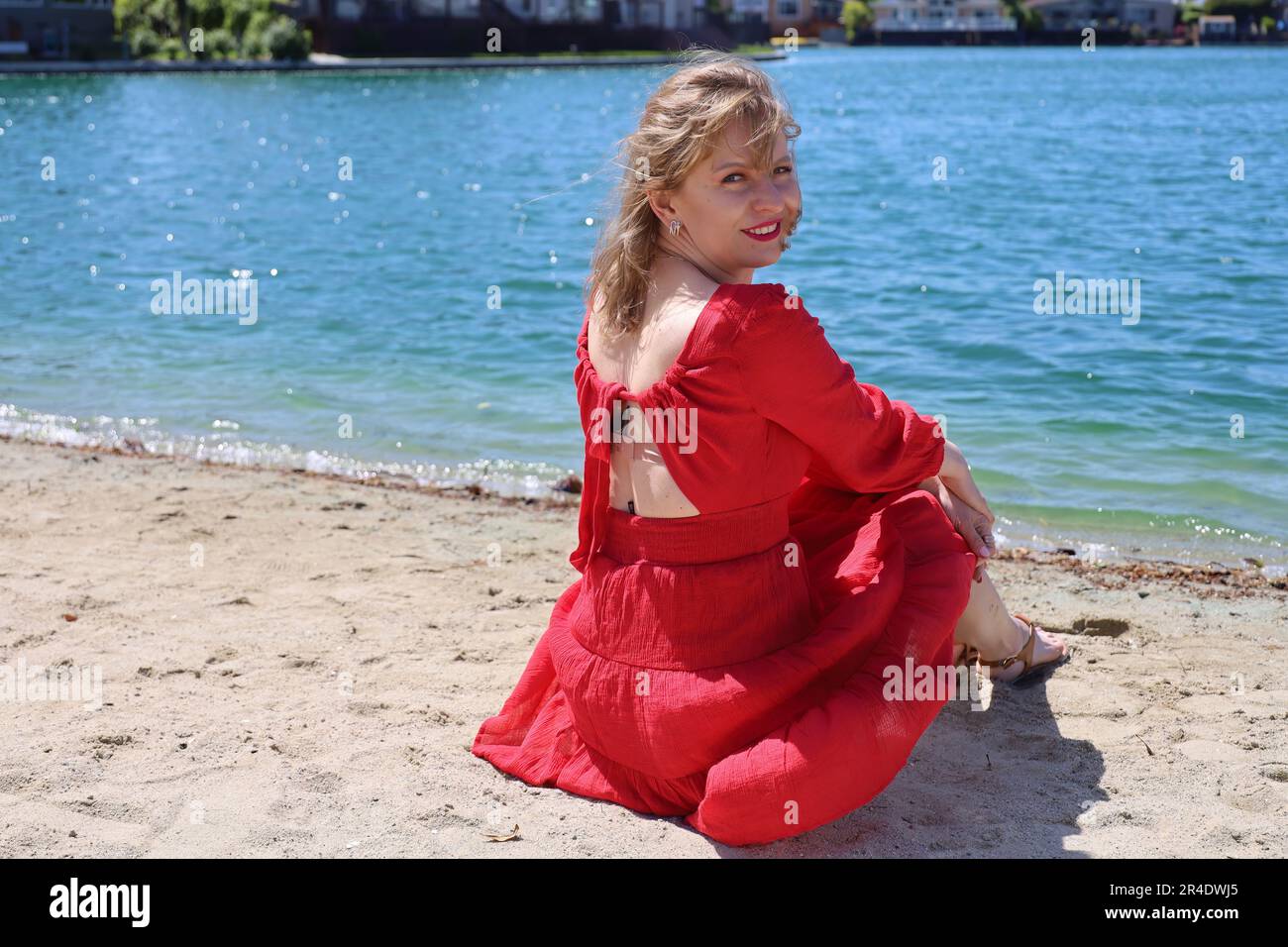 Photo of beautiful Russian lady in a park by a lake Stock Photo - Alamy
