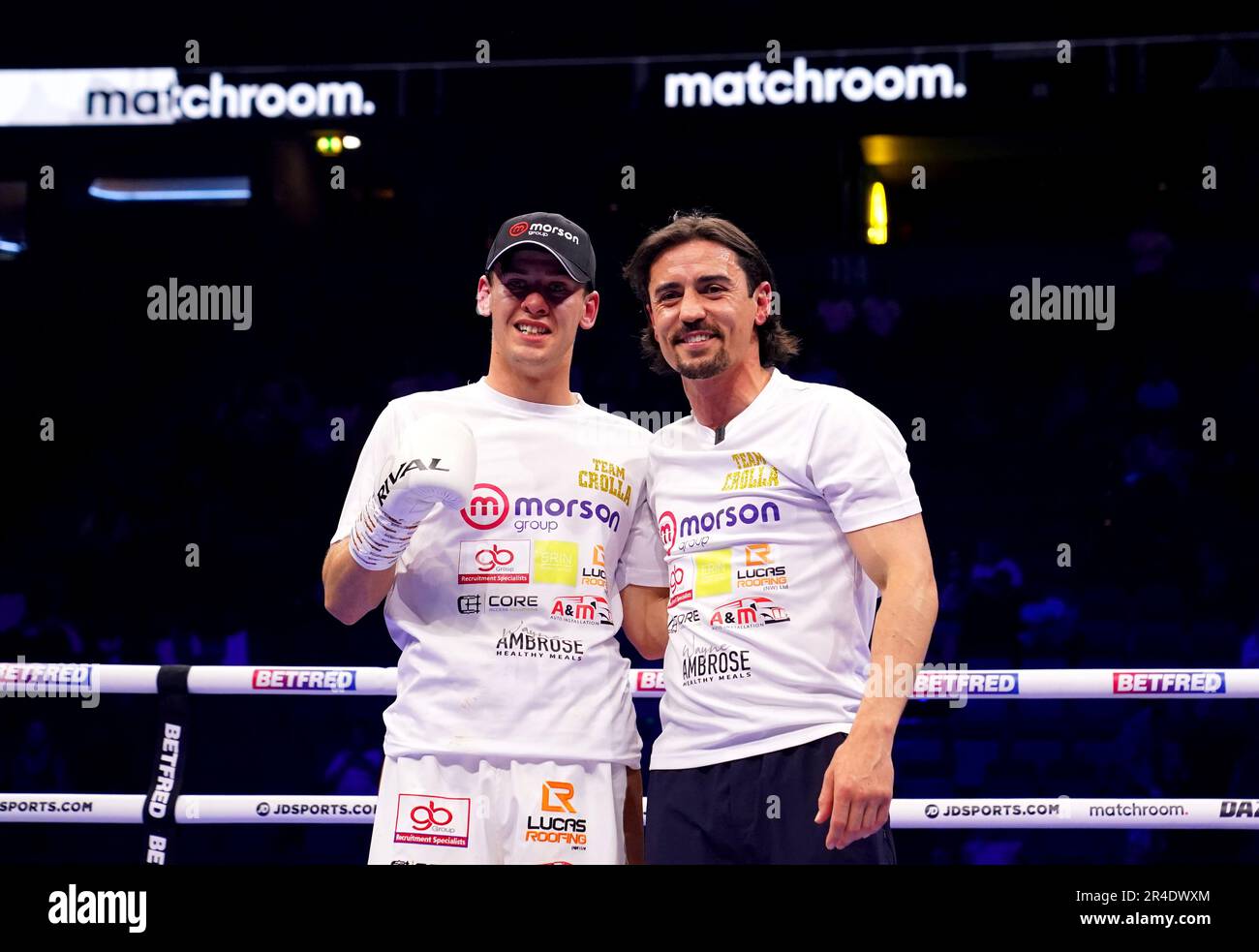 William Crolla (left) poses for a photo with his brother Anthony Crolla after winning his super ...