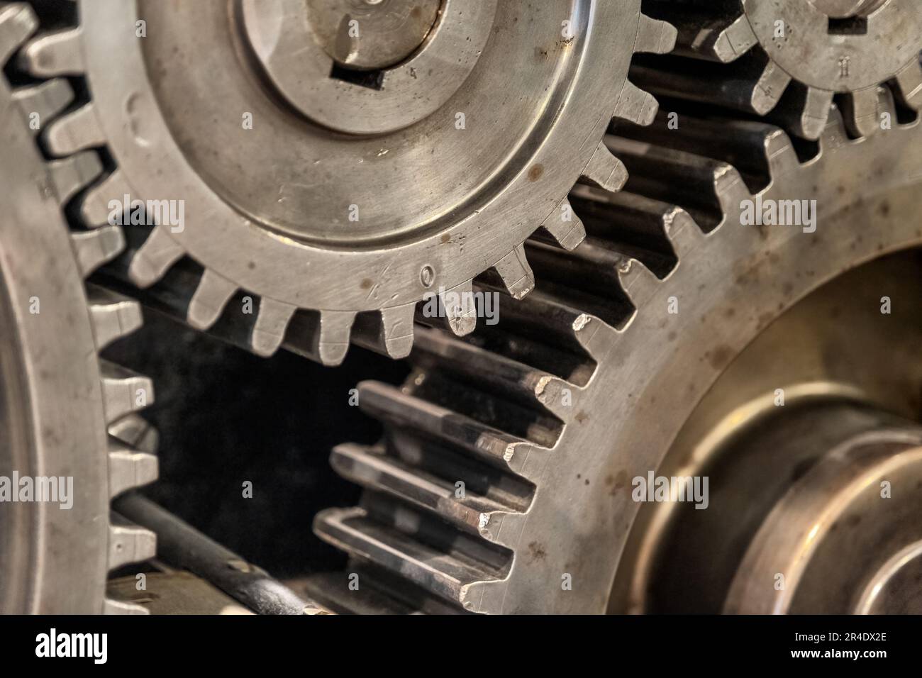 old steel gears close up background Stock Photo - Alamy
