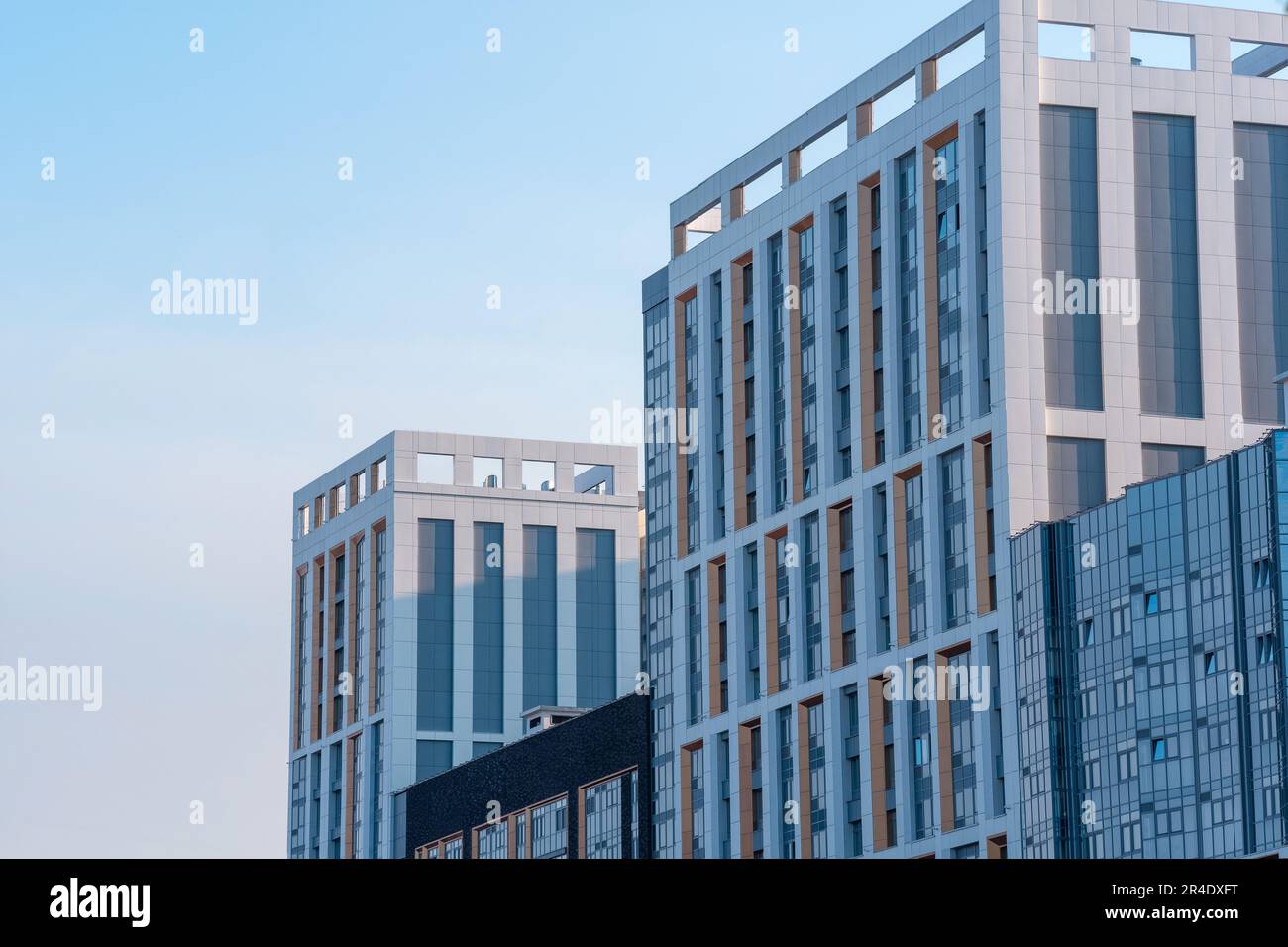 cityscape, urban background, group of facades of modern high-rise ...