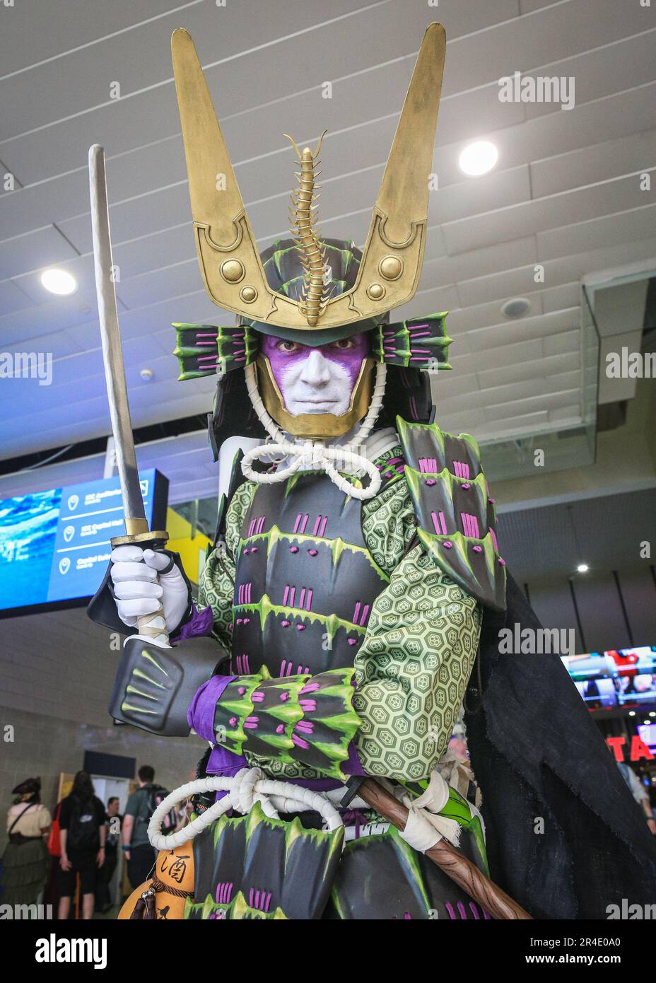 London, UK. 27th May, 2023. A visitor in fierce looking outfit. Fans ...