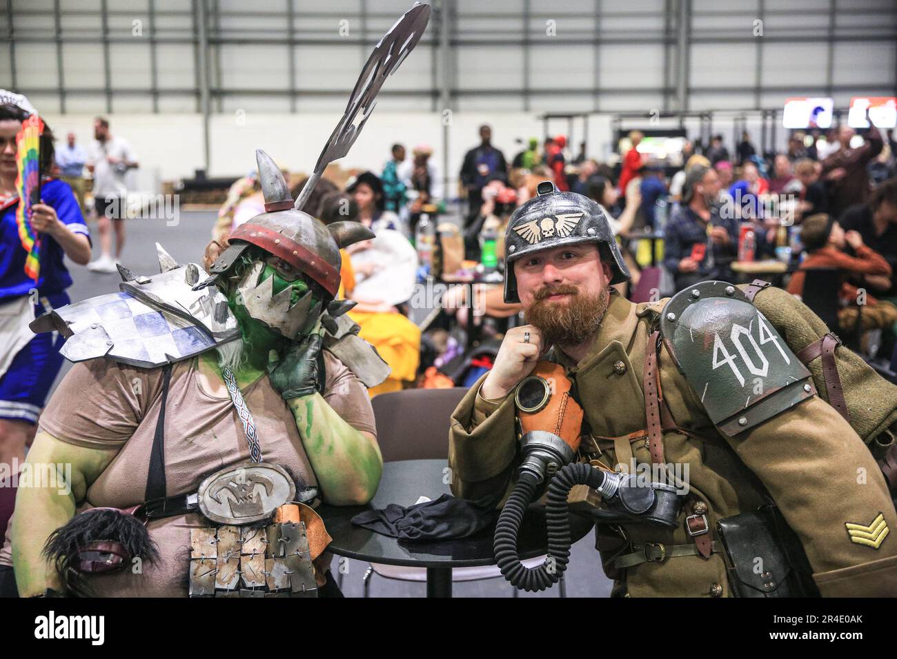 London, UK. 27th May, 2023. Two tired visitors relax in the indoor fan ...