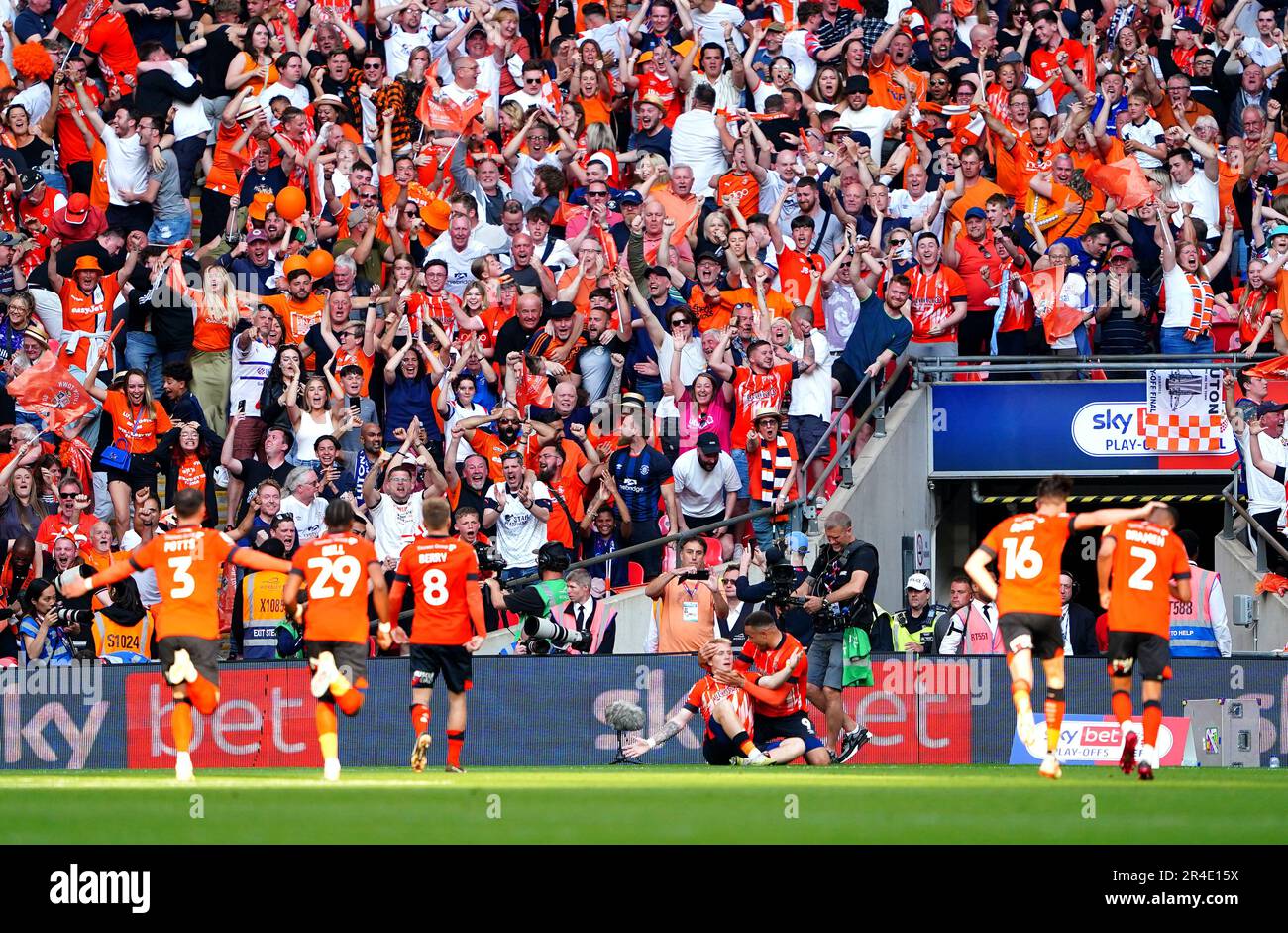 Luton Town's Joe Taylor celebrates with his team-mates after scoring a ...