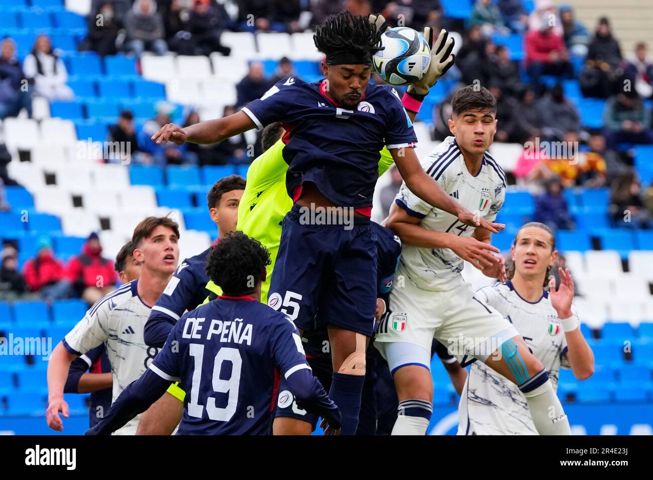 Dominican Republic's Kleffer Martes, top, heads the ball during a FIFA ...