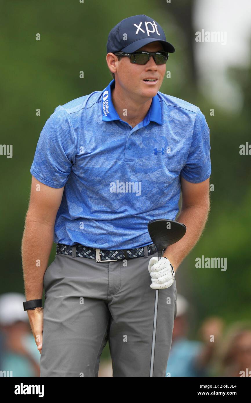 Adam Schenk watches hits a tee shot on the third hole during the third ...