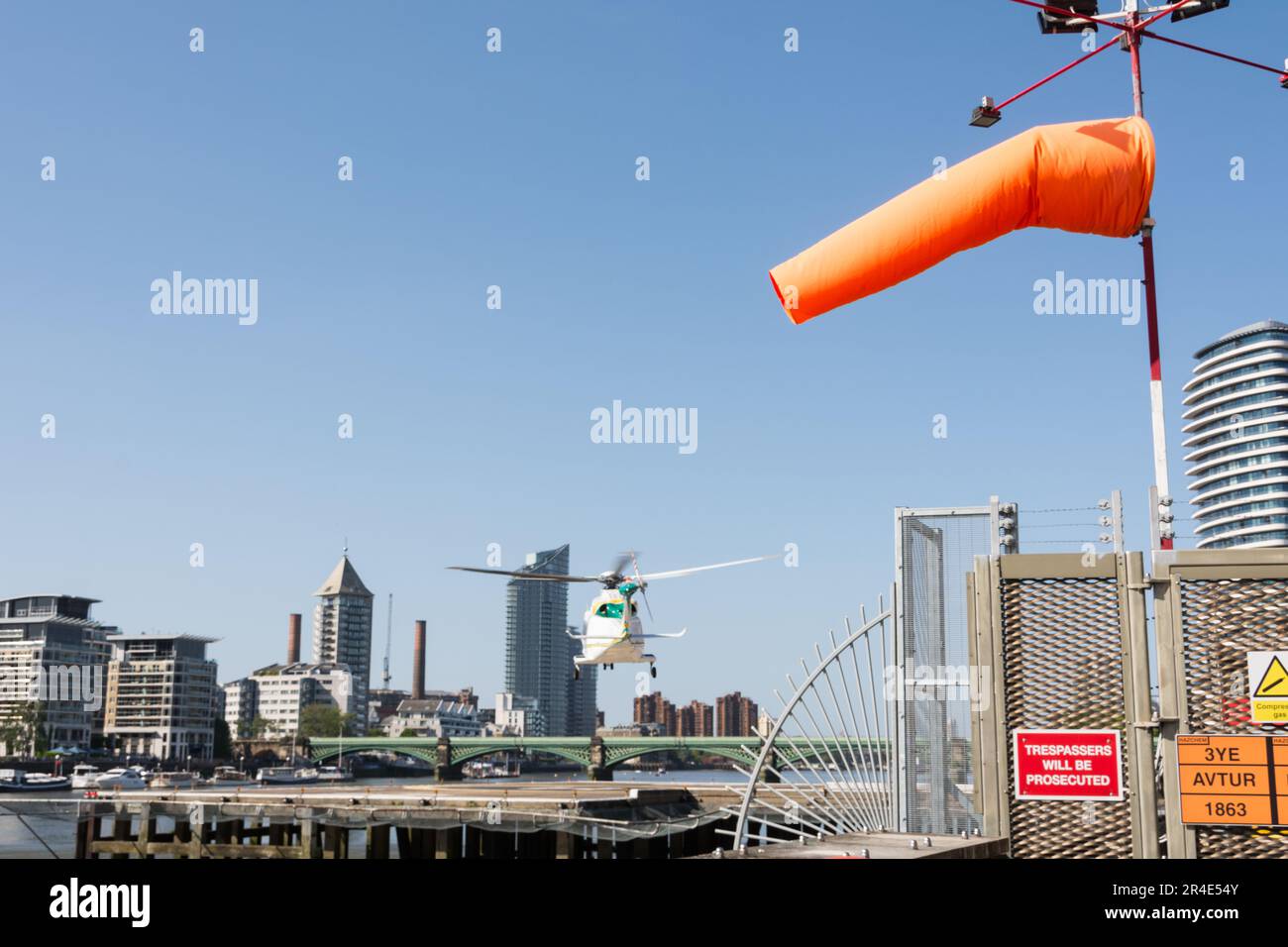 A helicopter taking off from London Heliport, Lombard Road, Battersea ...