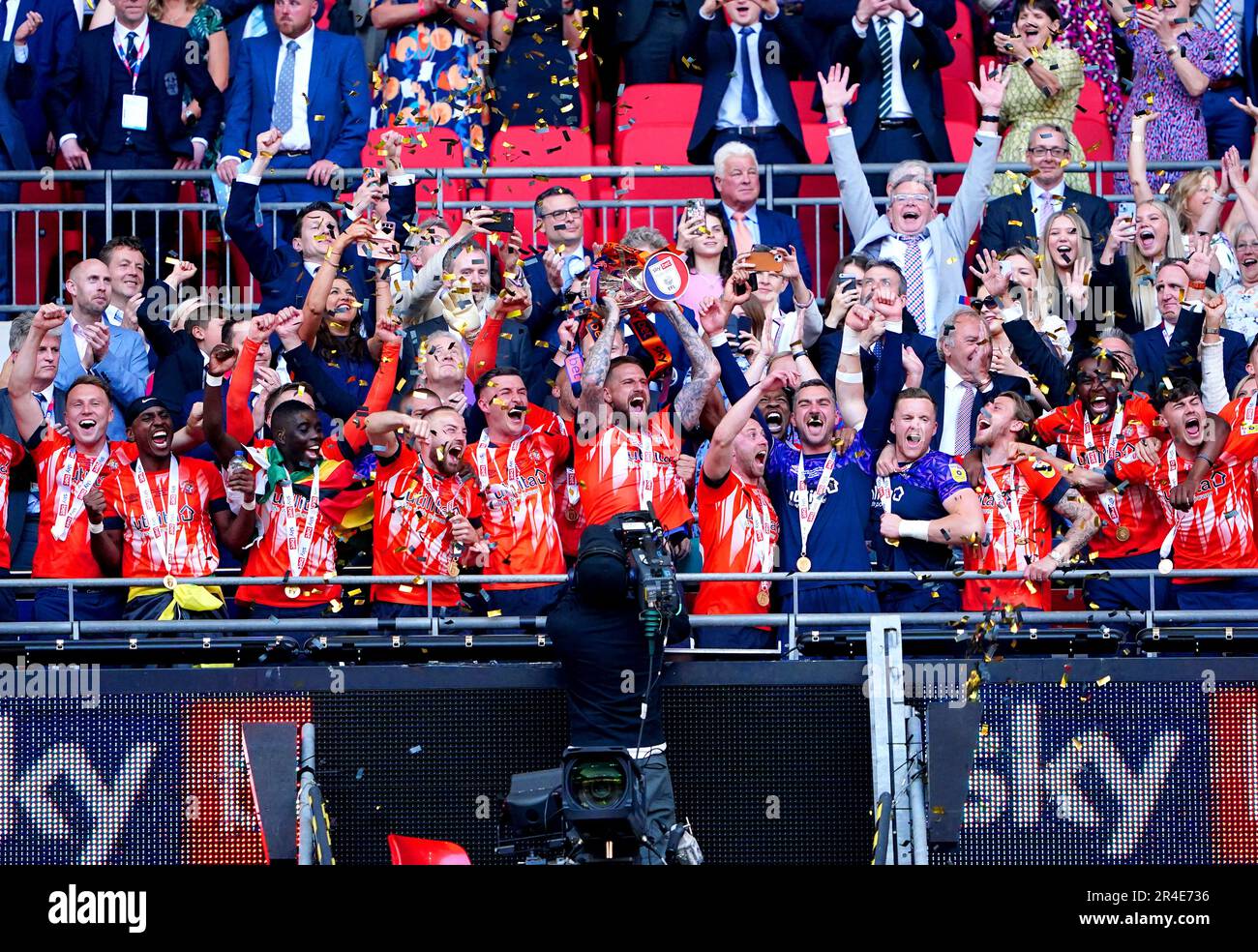 Luton Town's Sonny Bradley lifts the trophy after their sides victory ...