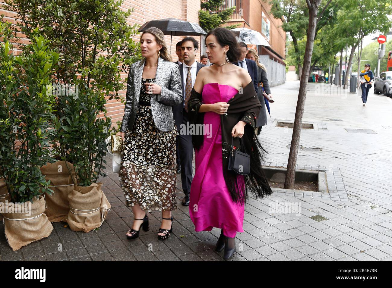 Family and friends on their arrival at the Church of the Holy Spirit ...
