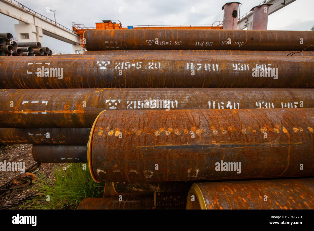 Rusted steel pipes outdoor warehouse Stock Photo - Alamy