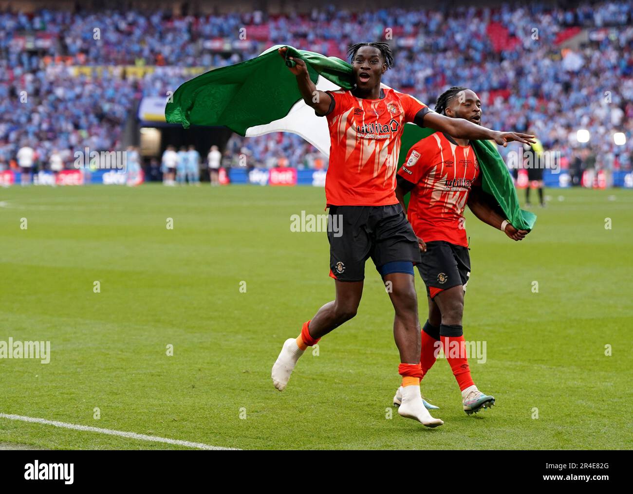 Luton Town's Elijah Adebayo (left) and Fred Onyedinma celebrate with a ...