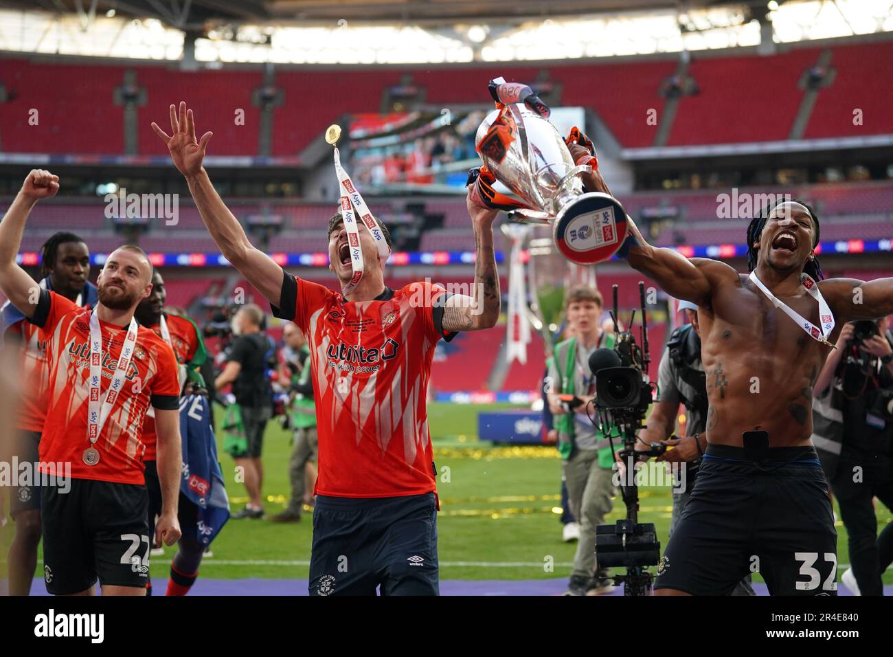 Luton Town's Gabriel Osho celebrates with the trophy following victory ...
