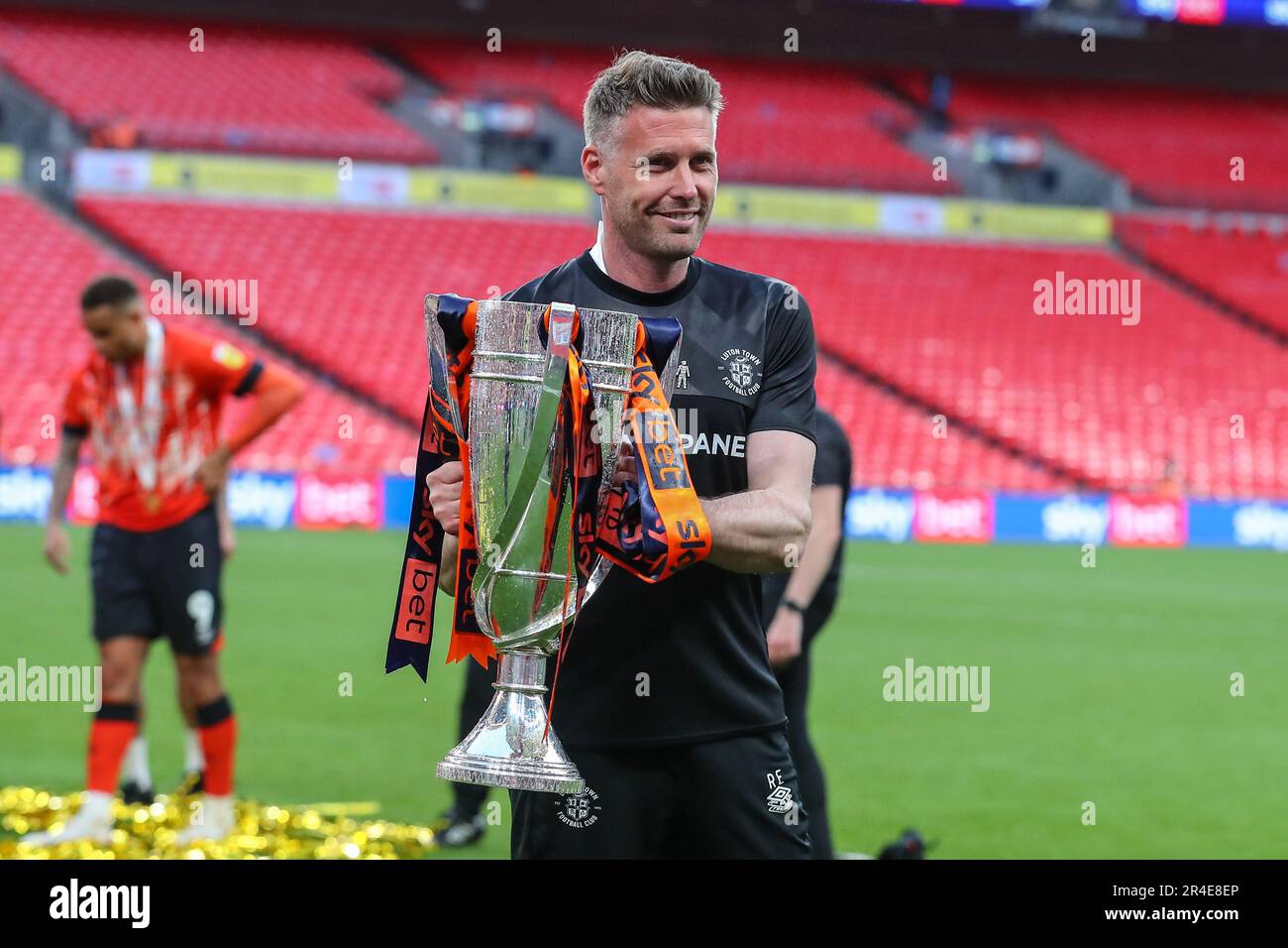 Luton Town Manager Rob Edwards hols the trophy after the Sky Bet ...