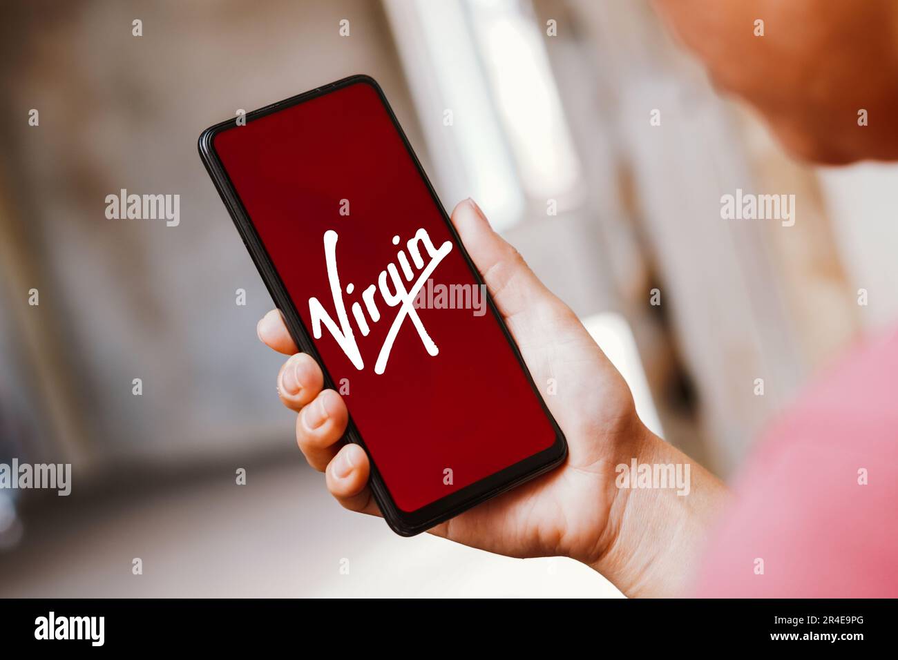 In this photo illustration, the Virgin Group logo is displayed on a ...