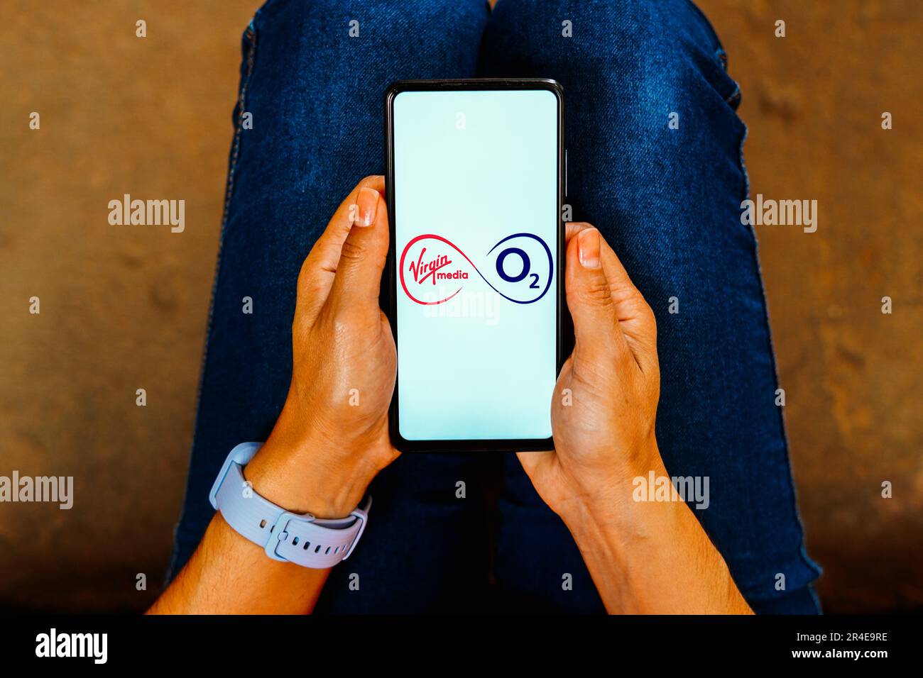 In this photo illustration, the Virgin Media O2 logo is displayed on a ...