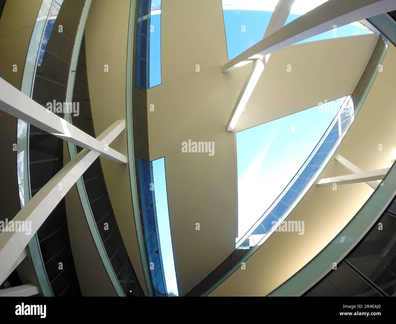 Image from below of a modern architecture building with a complex shape ...