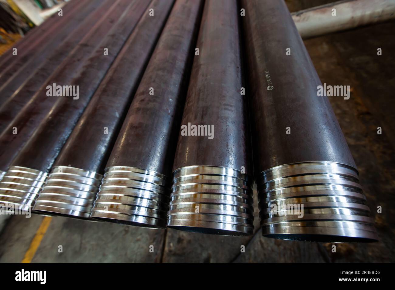 Oil drill pipes closeup photos. Short depth-of-field Stock Photo - Alamy